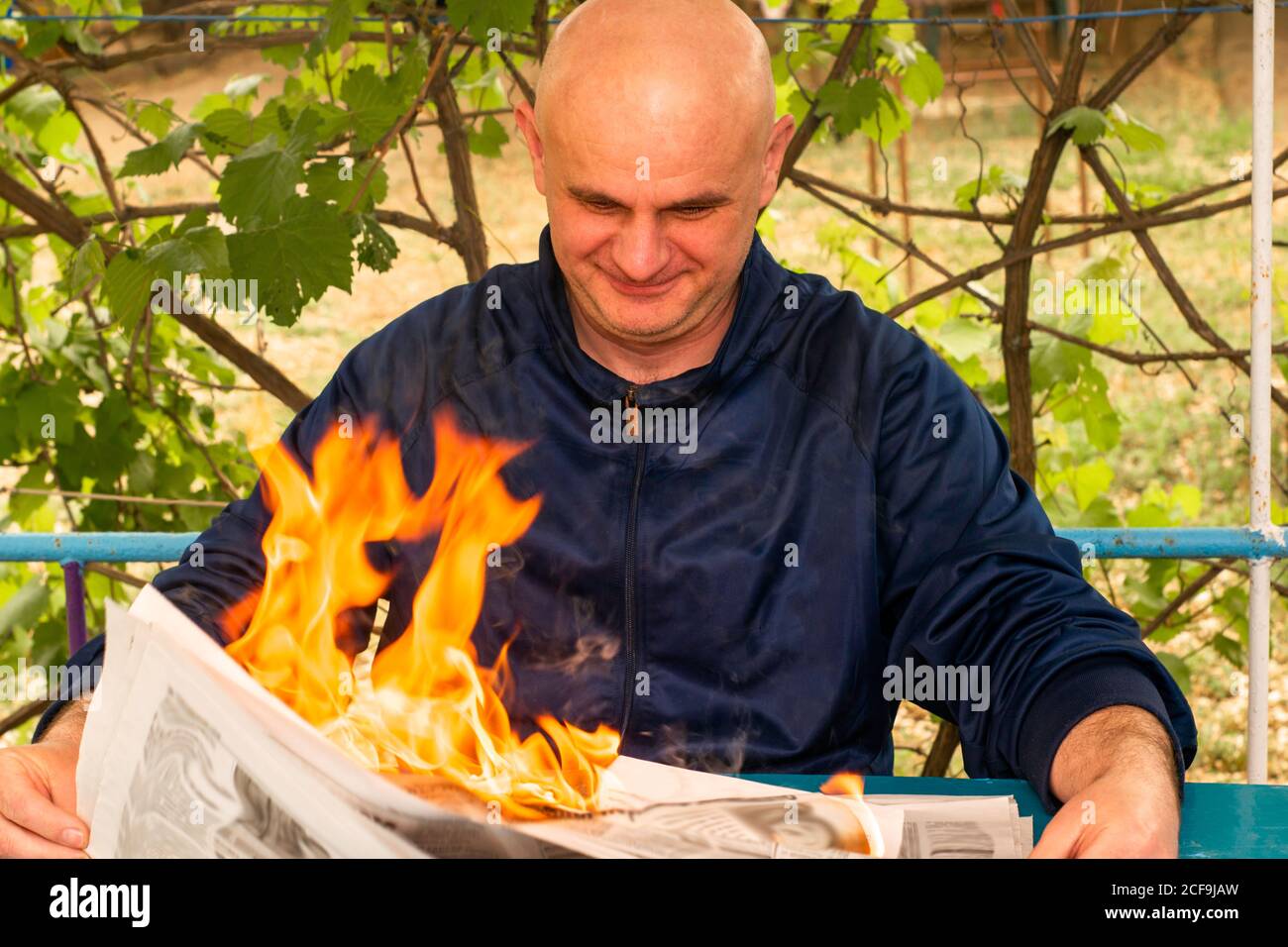 Burnt newspaper hi-res stock photography and images - Alamy