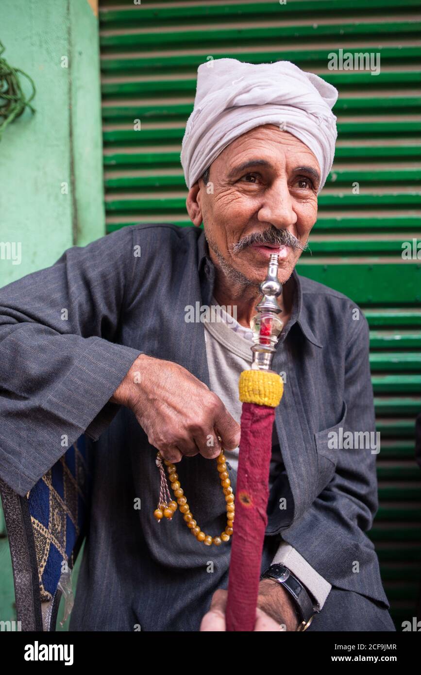 Cairo, Egypt - December 14, 2019: Group of calm adult ethnic man in ...