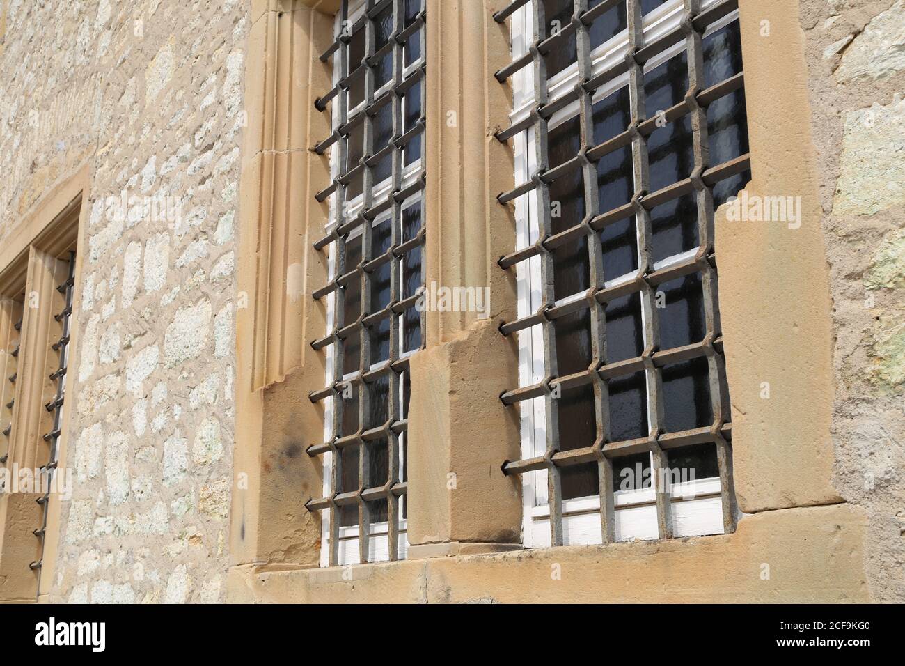 Closeup shot of iron fences on windows Stock Photo - Alamy