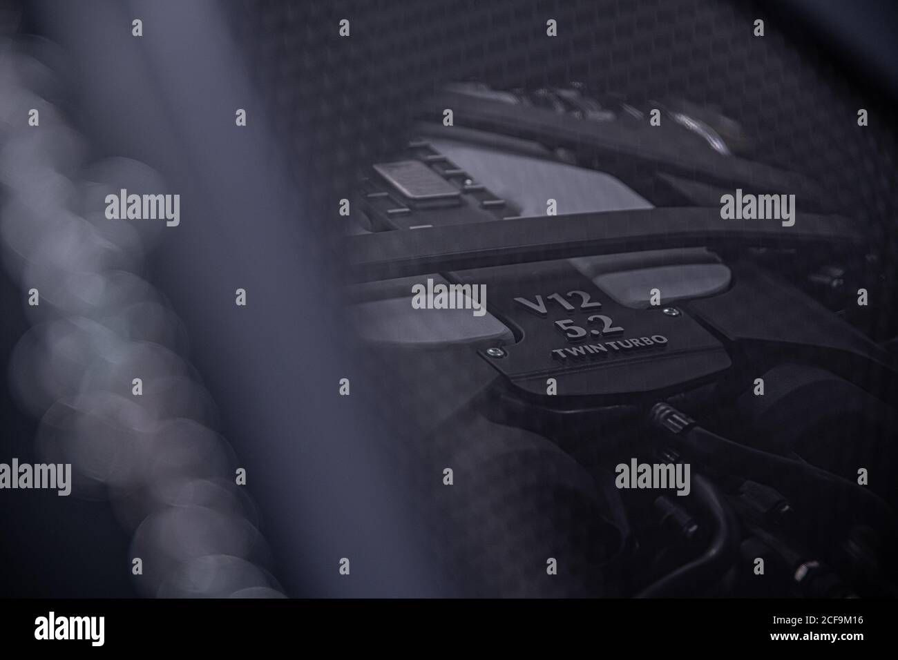 Sports car v12 turbo charged engine Stock Photo - Alamy