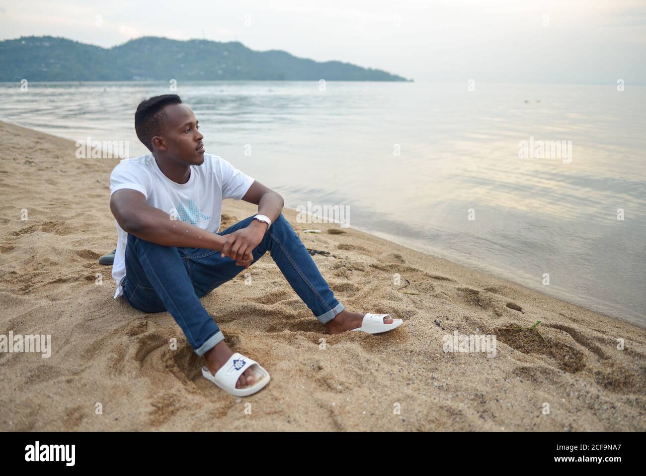Ruanda, Africa - December 14, 2019: African American guy in casual wear ...