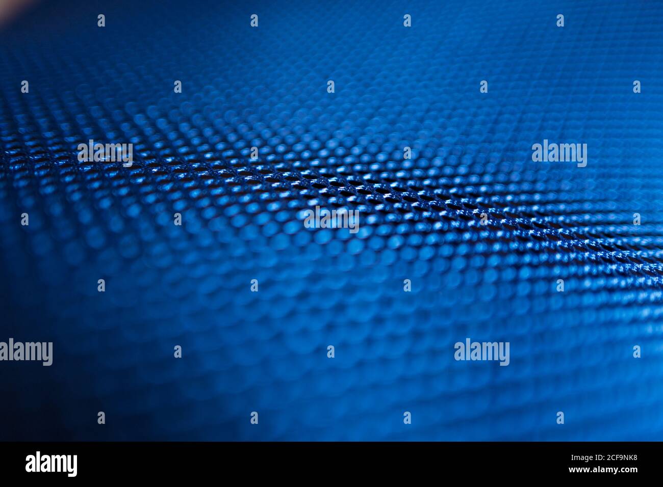 Blue net fabric of back of chair Stock Photo - Alamy