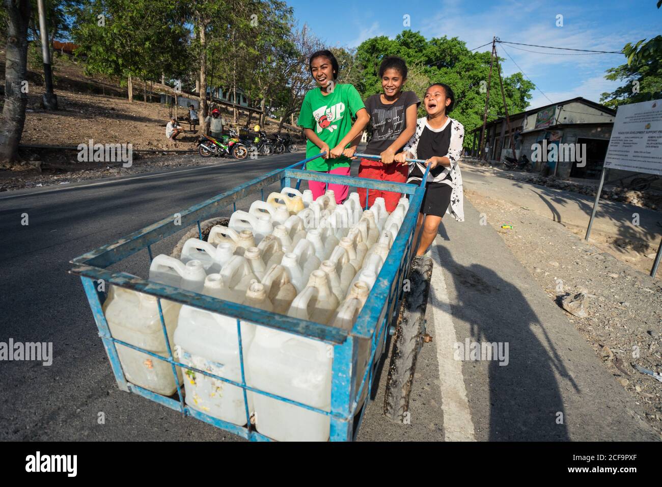 Timor Leste - August 17, 2018: Low angle of joyful poor ethnic children ...