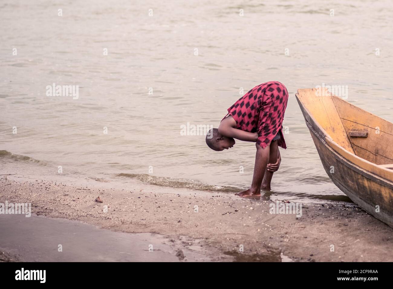 Girl washing in river hi-res stock photography and images - Alamy