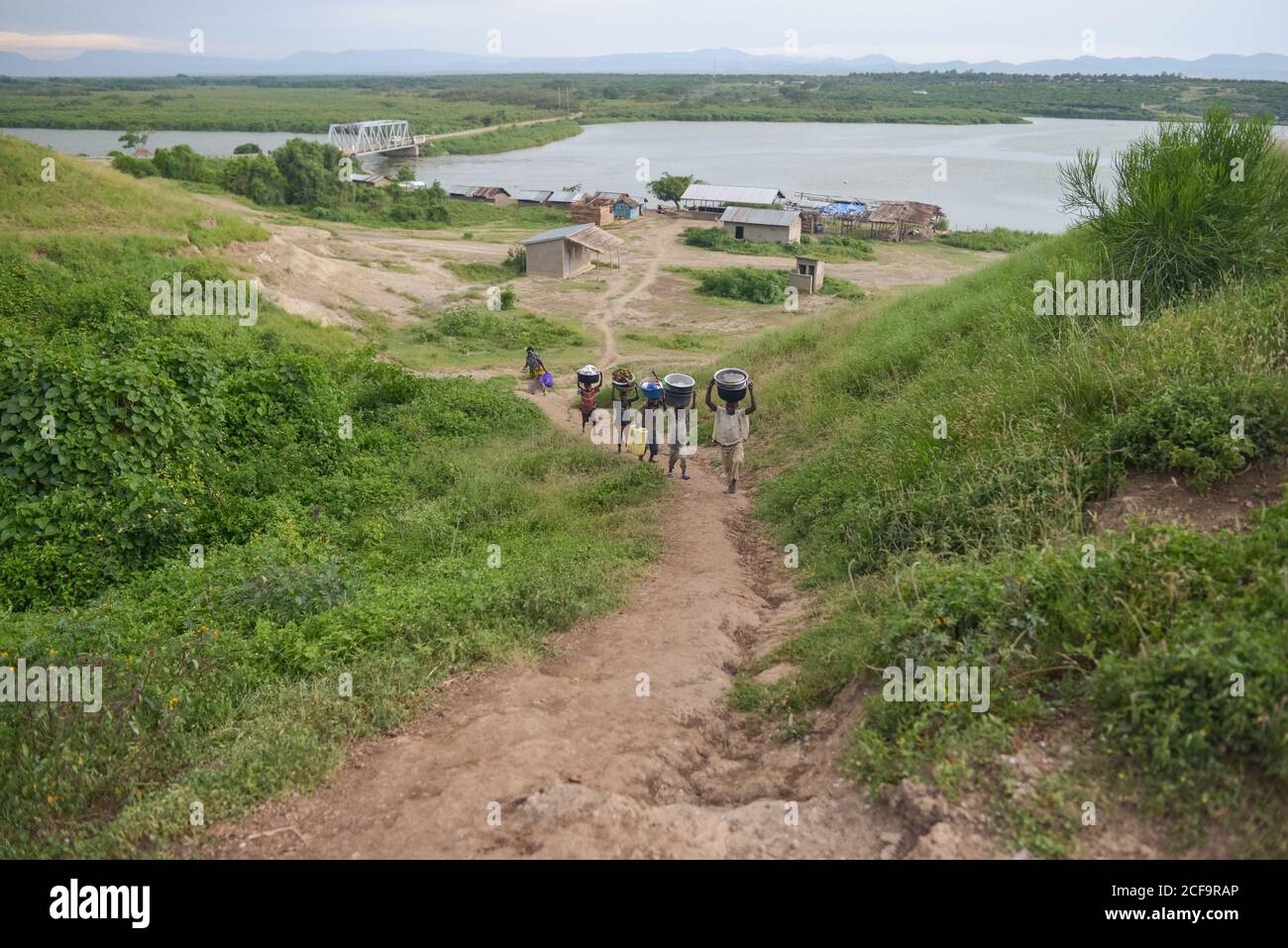 Children carrying heavy load hi-res stock photography and images - Alamy