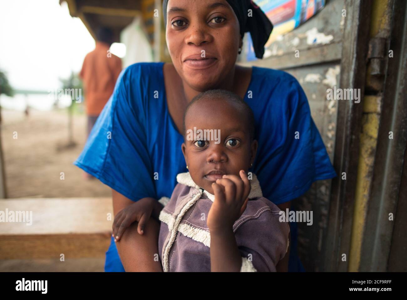 Uganda - November, 26 2016: Friendly African female with cute girl ...