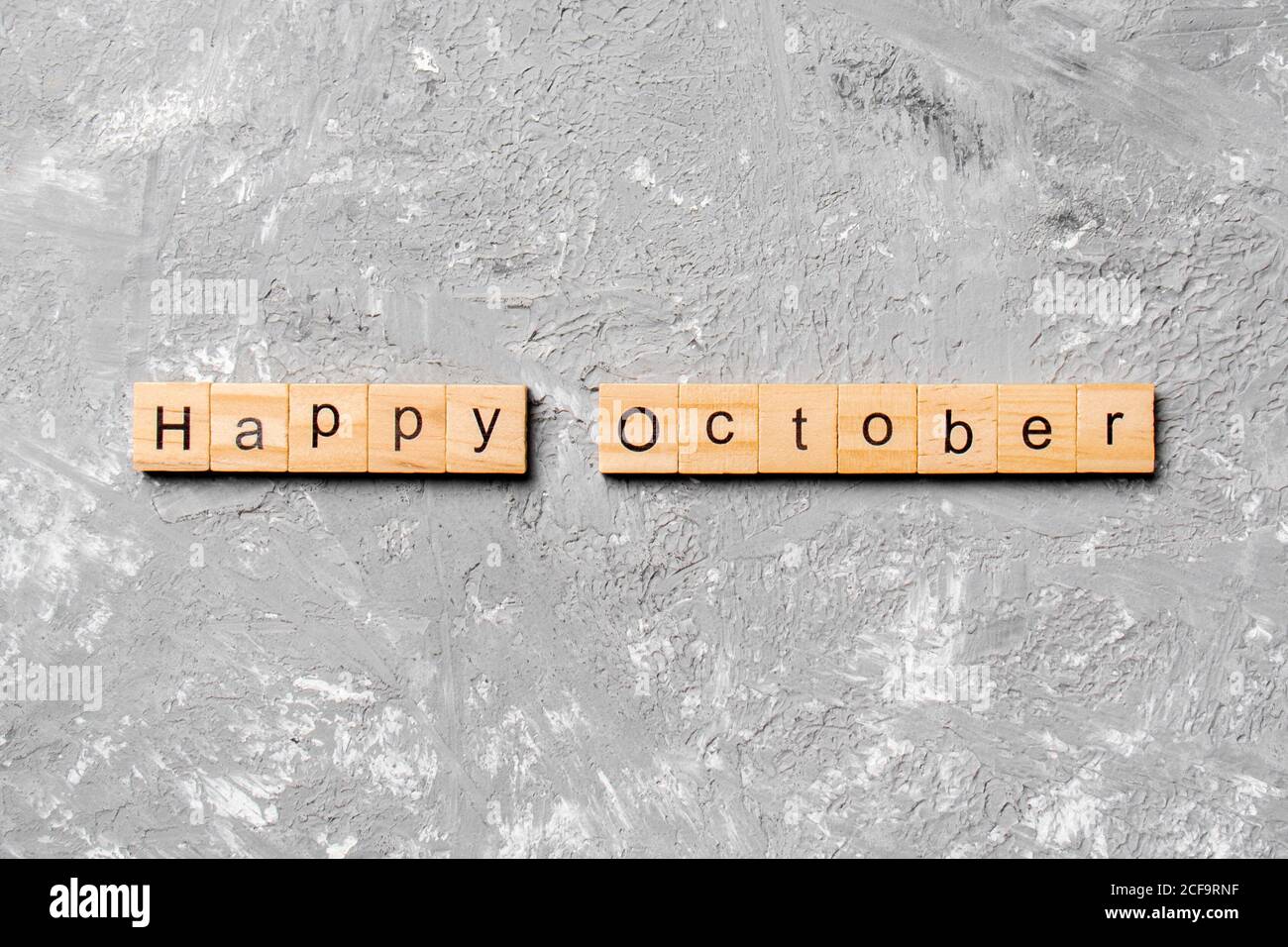 Happy october word written on wood block. Happy october text on table ...