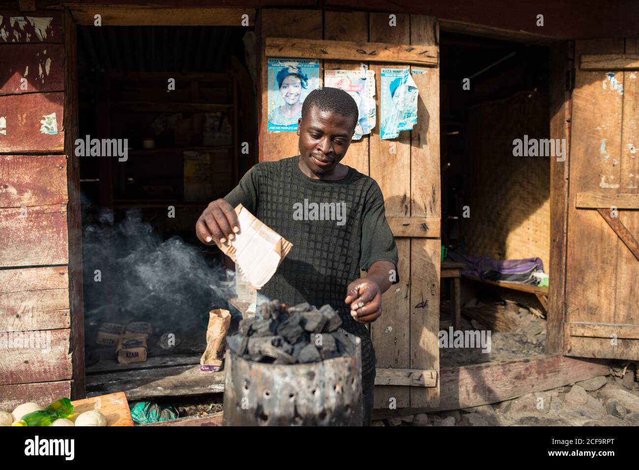 Charcoal burning in rural african hi-res stock photography and images ...