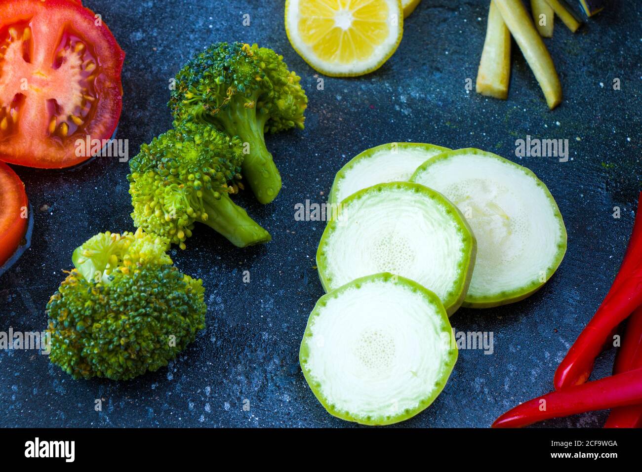 Chopped vegetables on the table, courgette and broccoli Stock Photo - Alamy