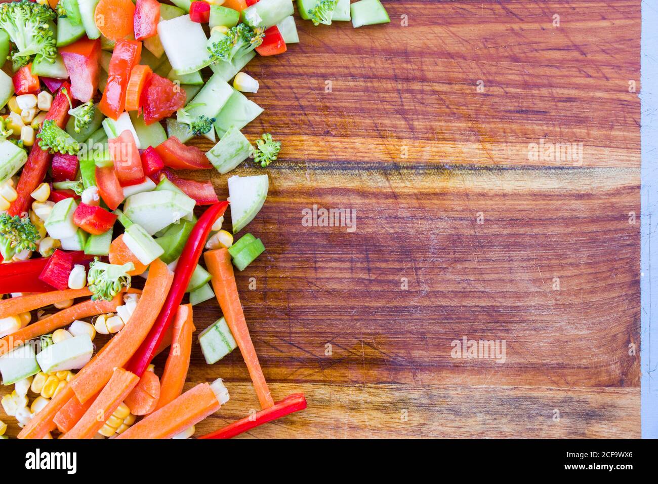 Chopped vegetables on the board, wooden material Stock Photo - Alamy