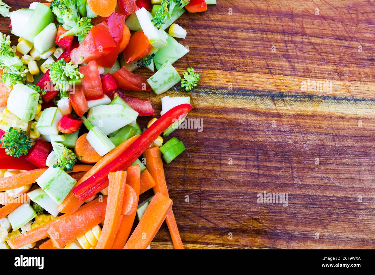 Chopped vegetables on the board, wooden material Stock Photo - Alamy