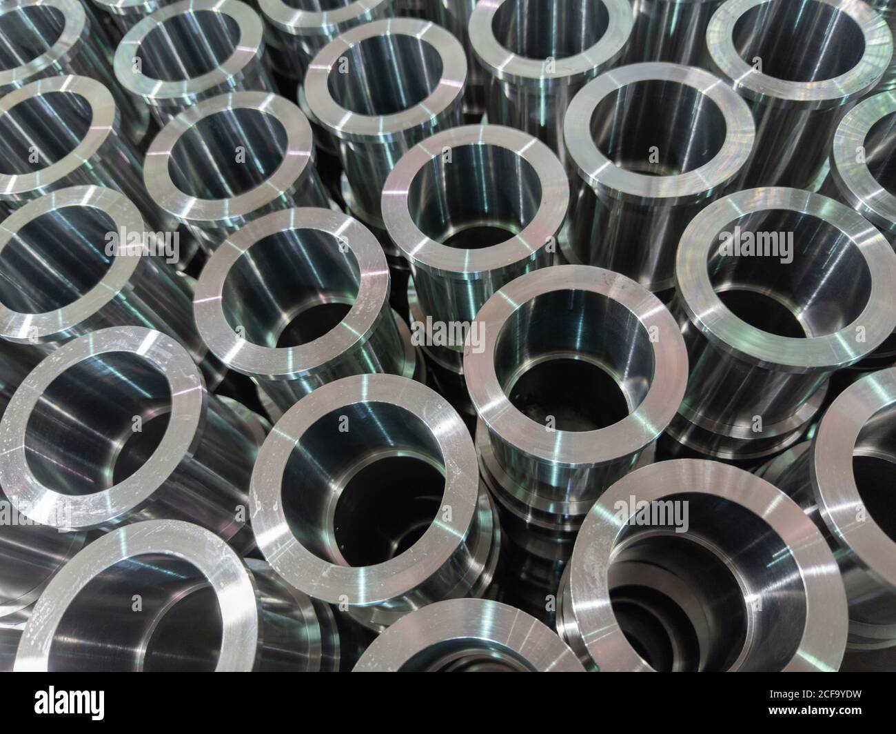 abstract industrial shiny steel production stack background with cnc ...