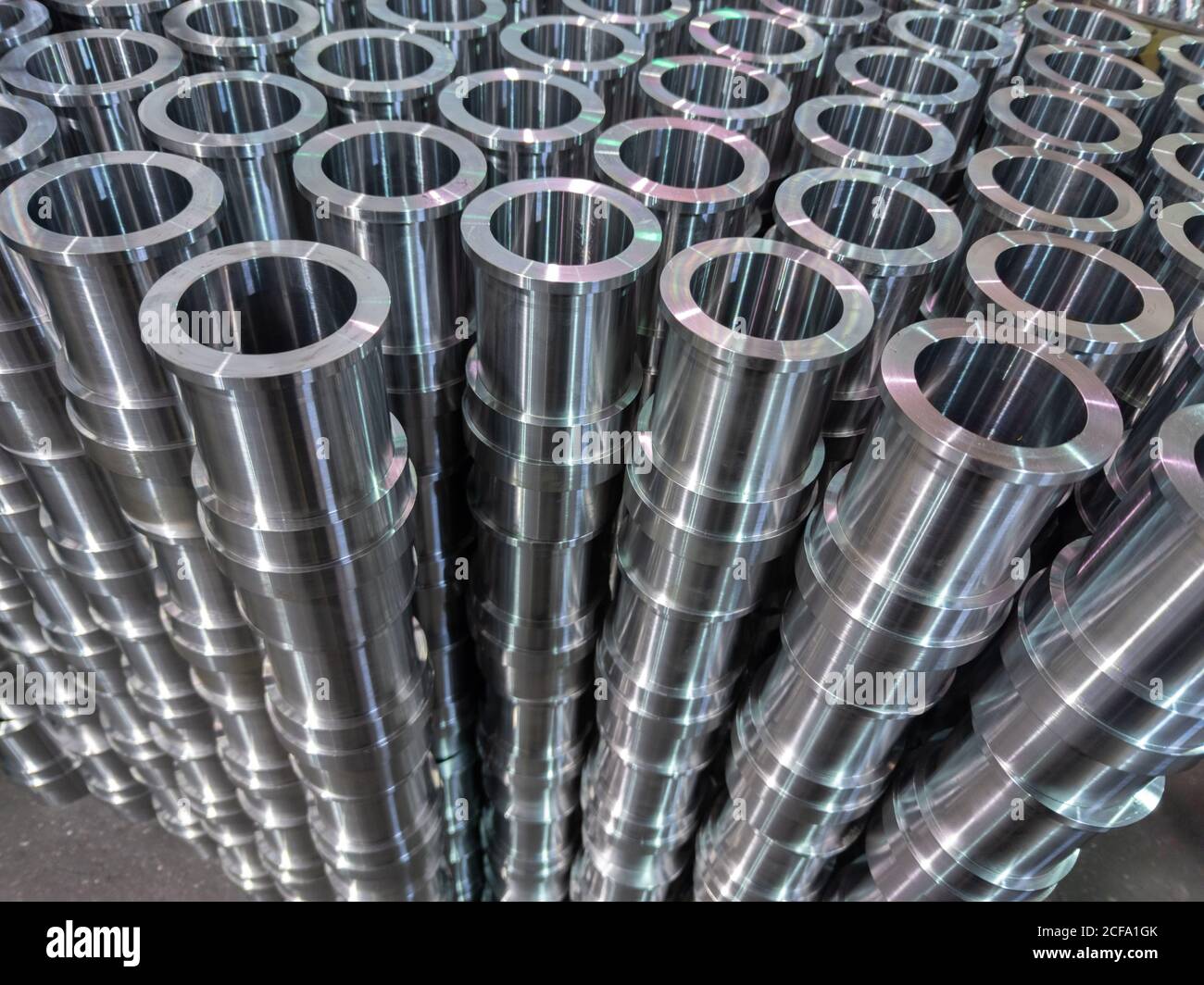 abstract industrial shiny steel production stack background with cnc ...