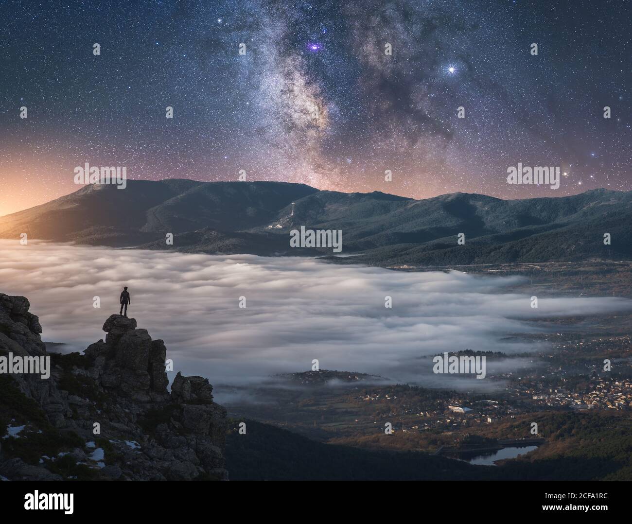 Watching sunrise cliff top hi-res stock photography and images - Alamy