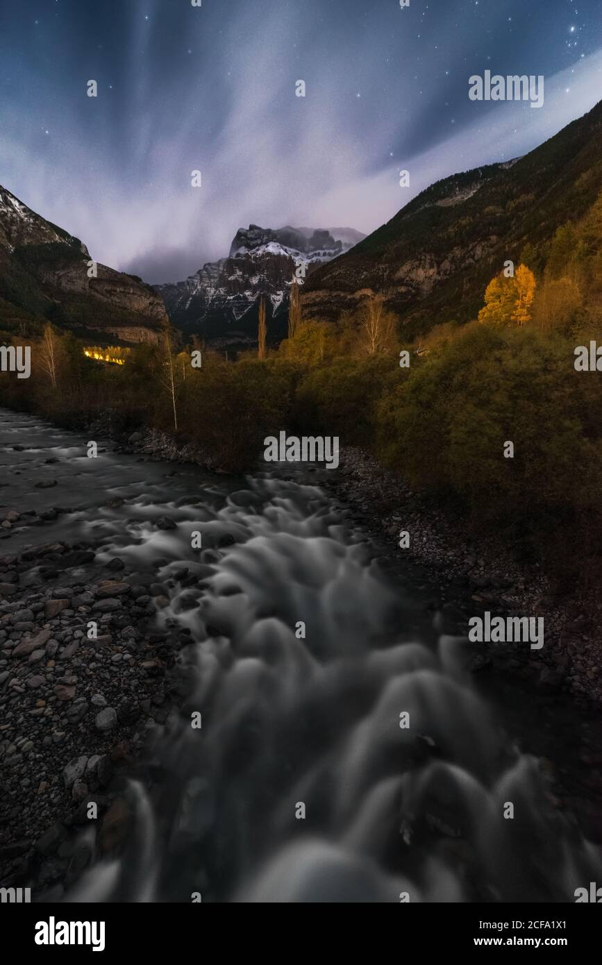 Amazing view of incredible mountain waterfall flowing over majestic ...