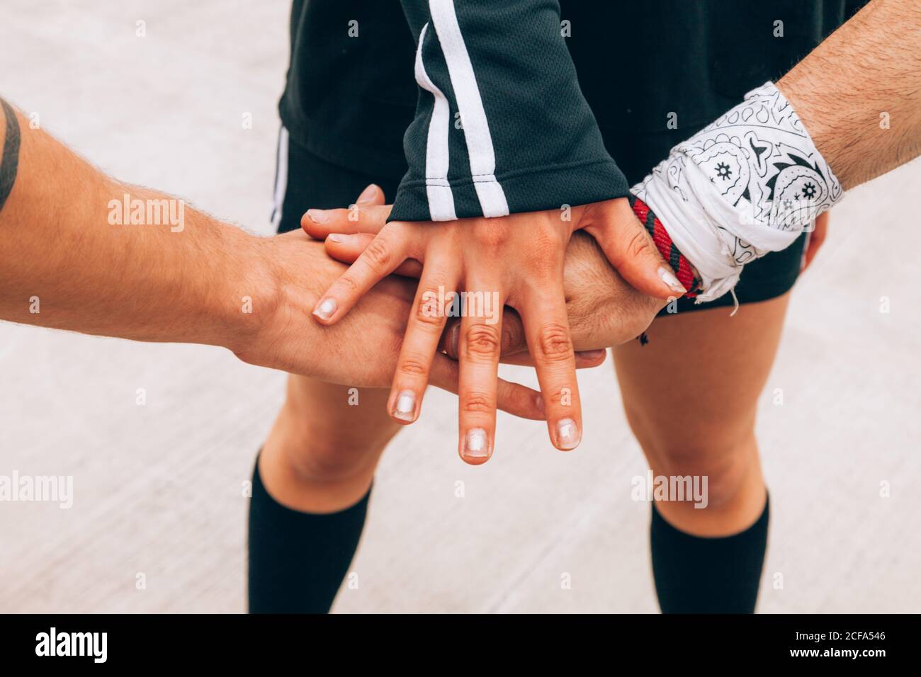 Putting hands hi-res stock photography and images - Alamy