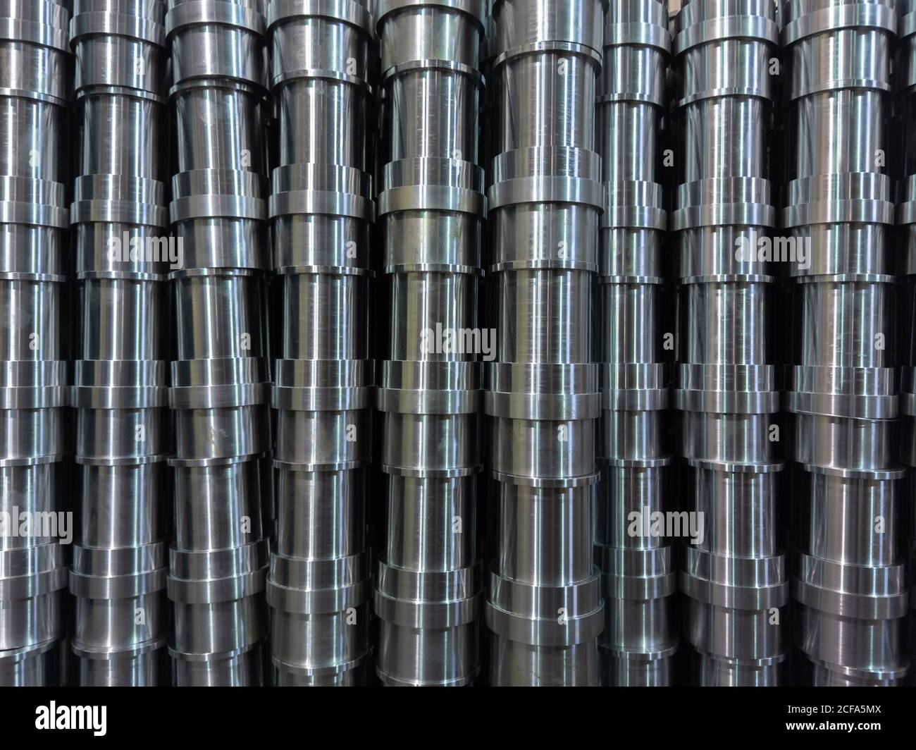 abstract industrial shiny steel production stack full frame background ...