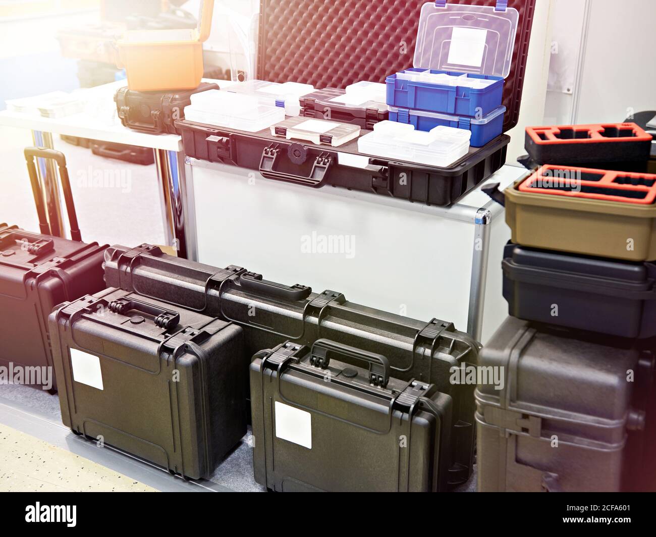Black tools boxes in hardware store Stock Photo - Alamy