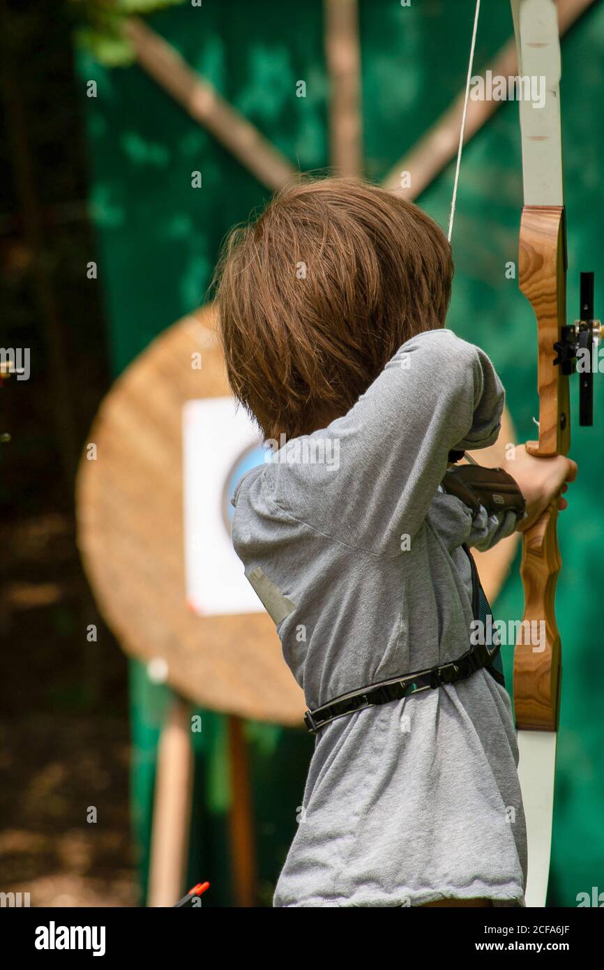 A boy takes aim at an archery competition Stock Photo - Alamy