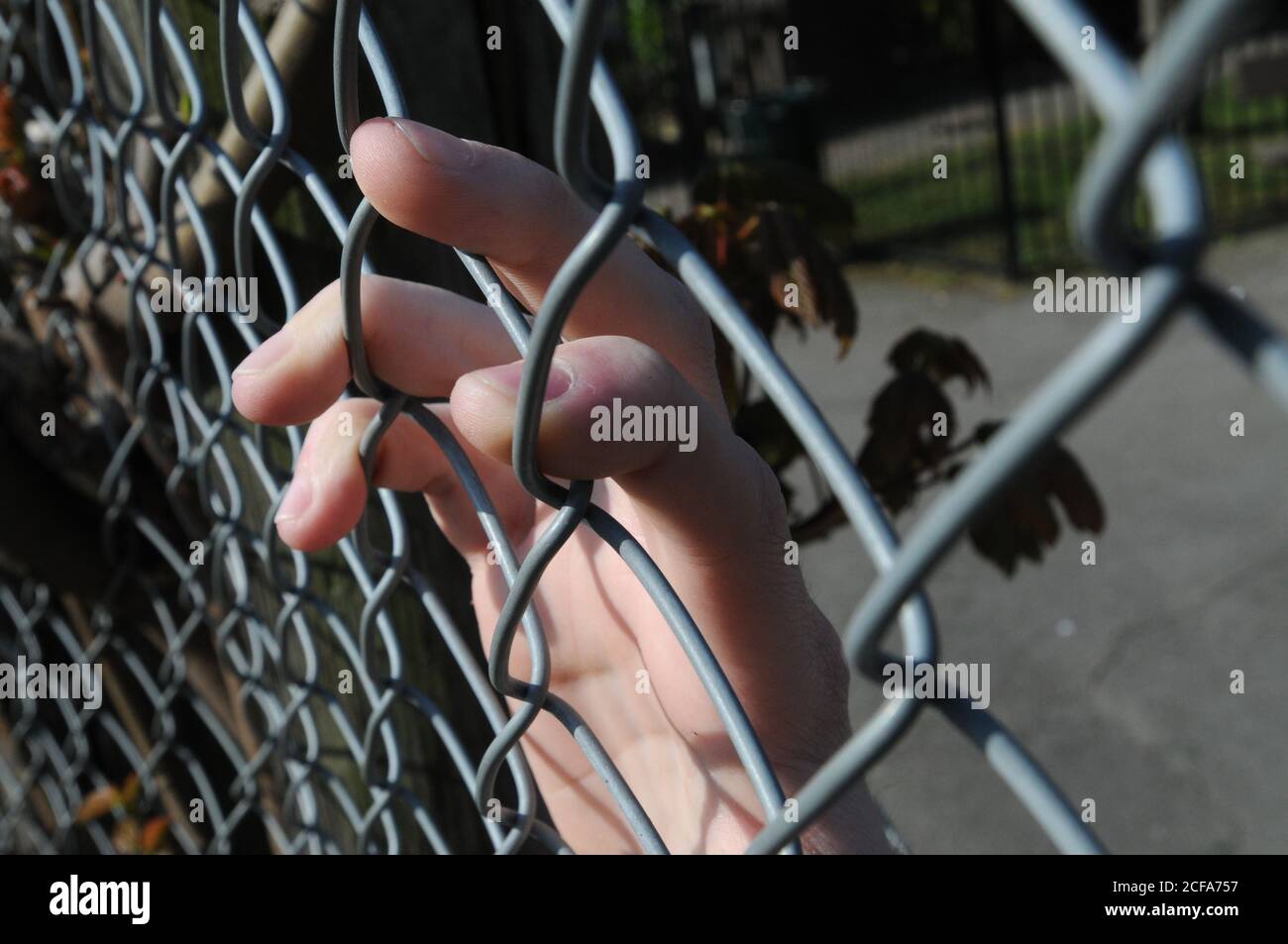 Hanging on by fingernails hi-res stock photography and images - Alamy