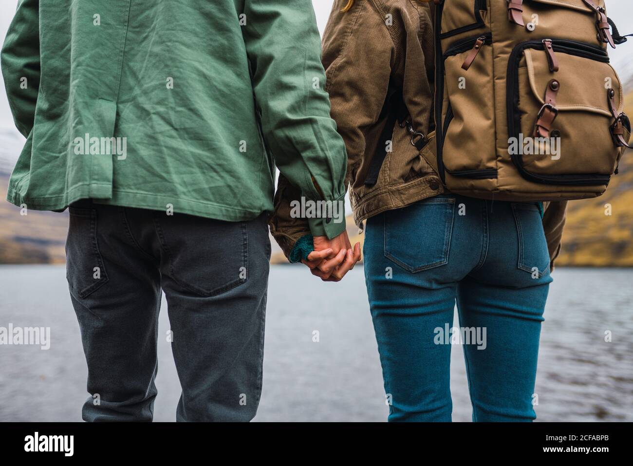 Back view couple holding hands hi-res stock photography and images - Alamy