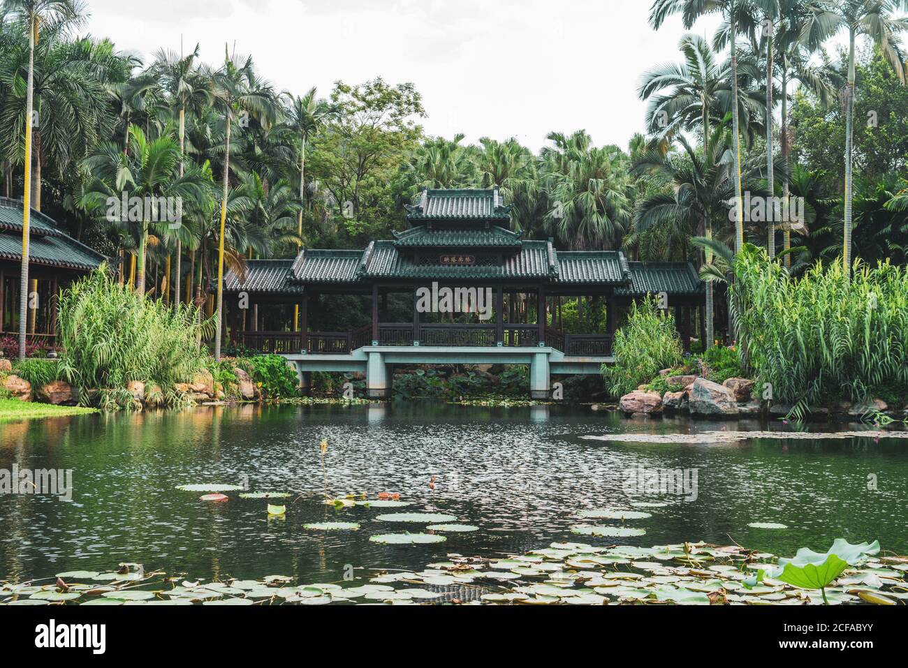 Landscape of old oriental building on lake Stock Photo - Alamy