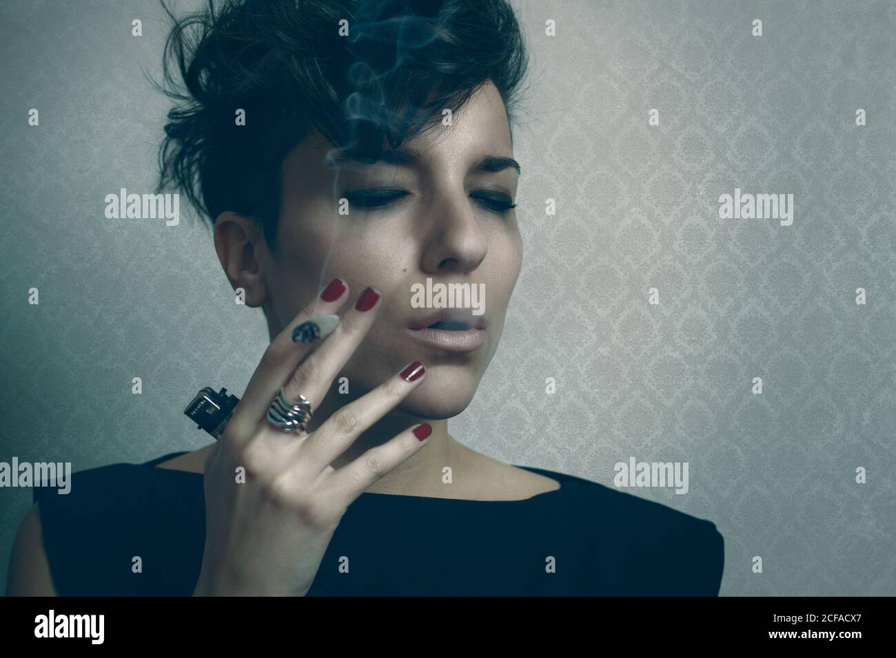 Crying woman with cigarette hi-res stock photography and images - Alamy