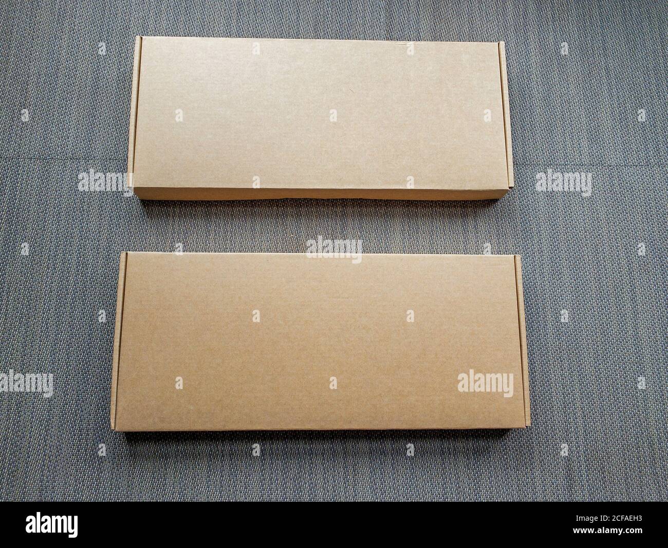 Two Long Cardboard Boxes Packages Closed Stock Photo - Alamy