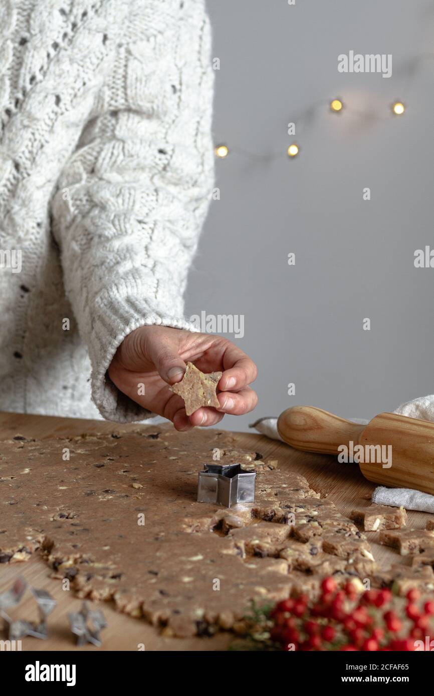 anonymous lady preparing cookies with tin form for baking Stock Photo ...