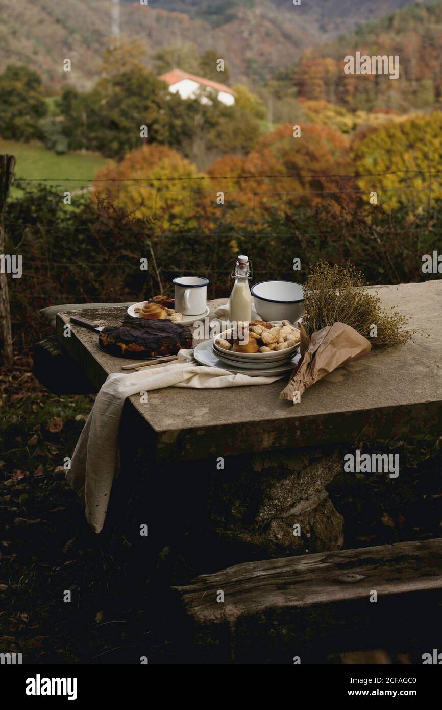 Table with bakery food for outdoors picnic Stock Photo - Alamy