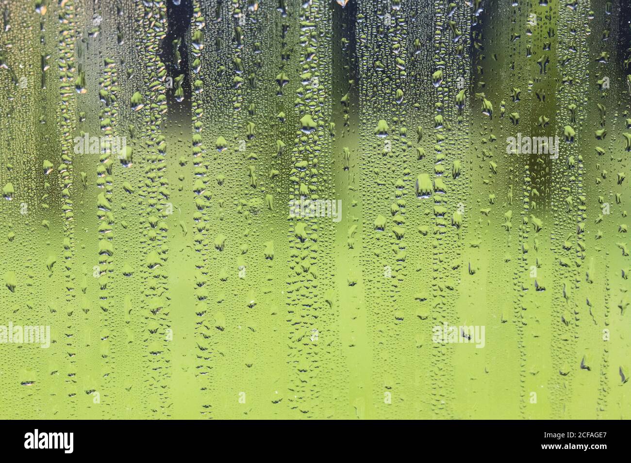 Steamy window with striped water drop pattern Stock Photo - Alamy