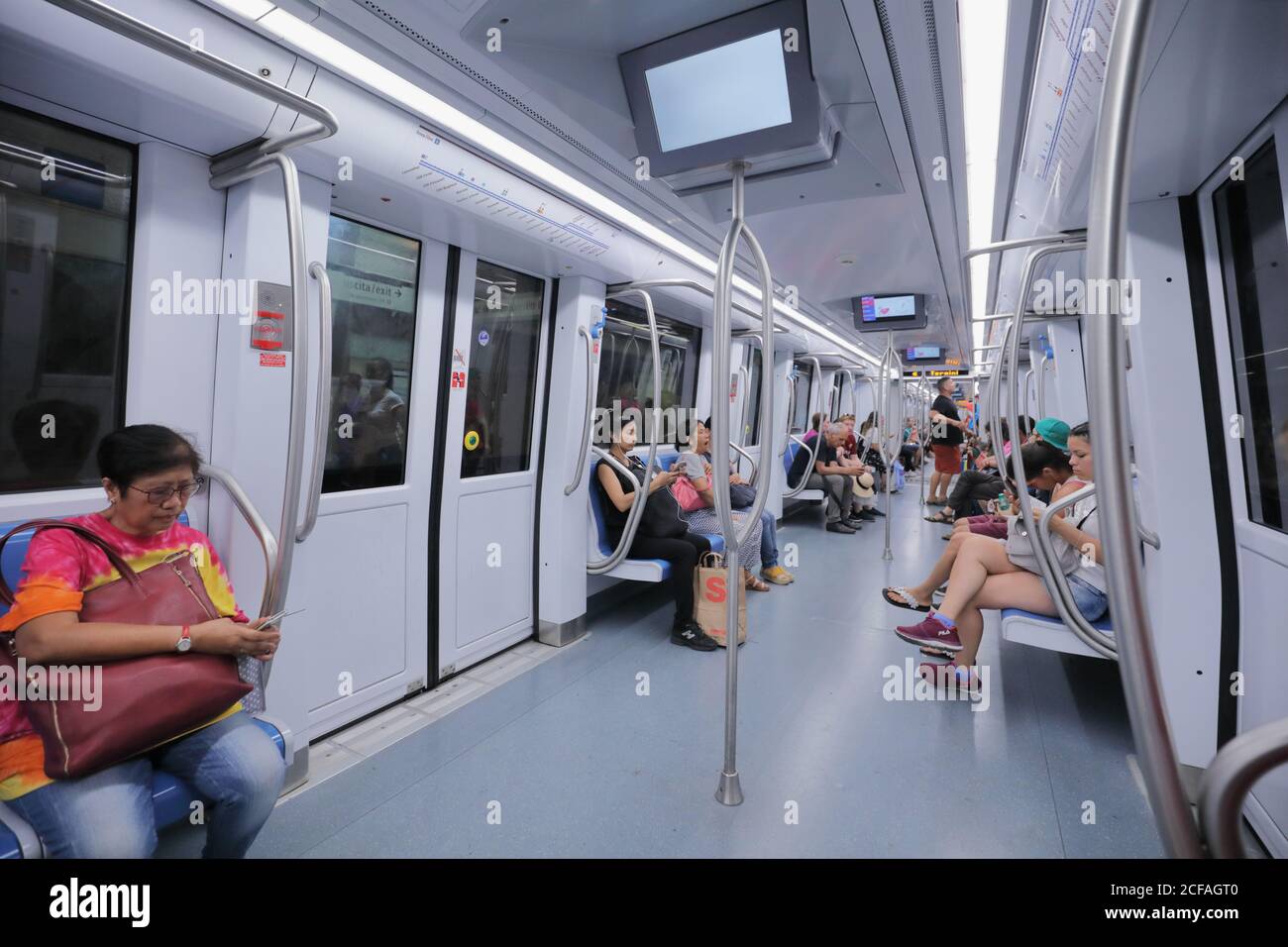 Rome, Italy - August 14, 2018: People in a subway train in Metro of ...