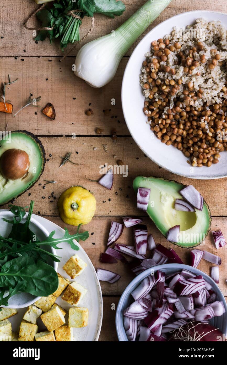 Different kind of vegetables and ingredients on rustic table Stock ...