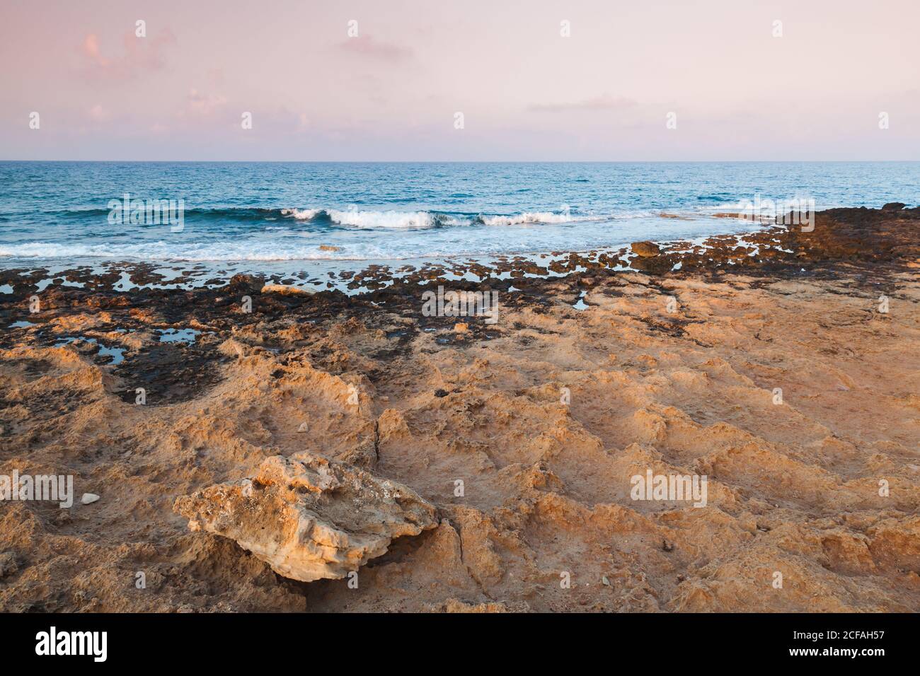 Rocky coast cyprus sunset hi-res stock photography and images - Alamy