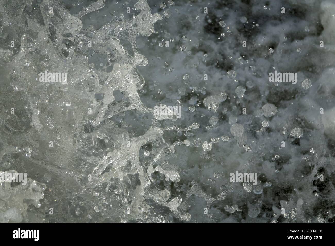 Water splashes from waterfall close-up. Beauty of clear spring water ...