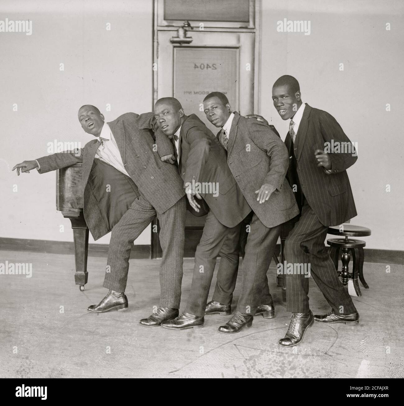 Negro singing and dancing group Stock Photo - Alamy