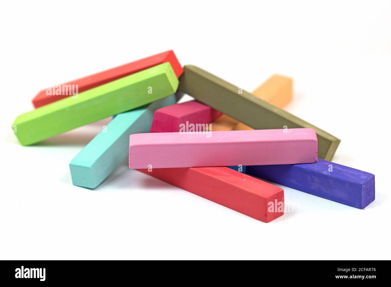 Colorful pastel chalk against a white background Stock Photo - Alamy