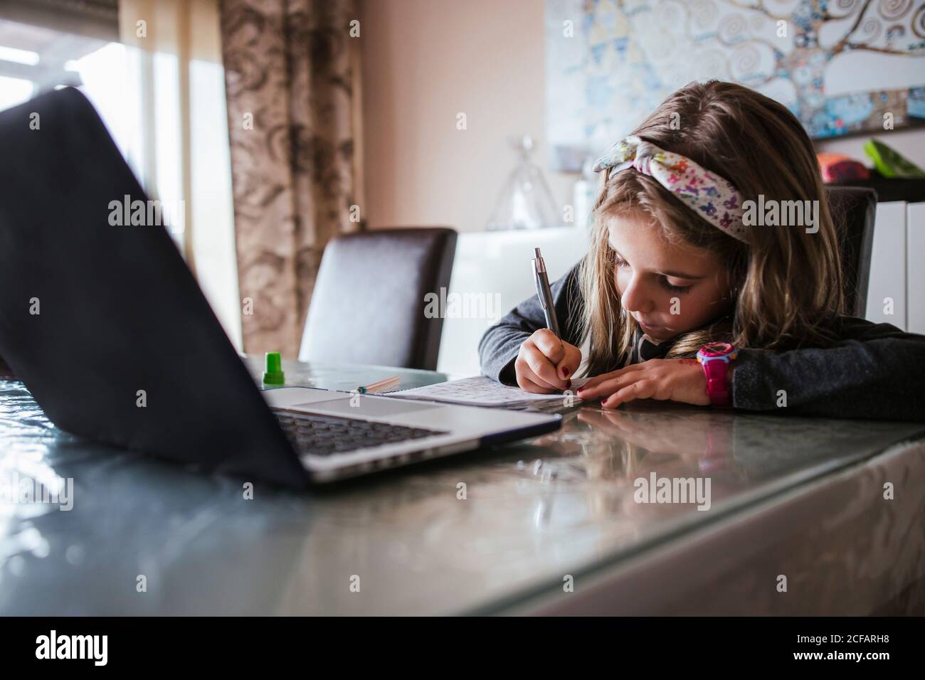 Doing assignment hi-res stock photography and images - Alamy