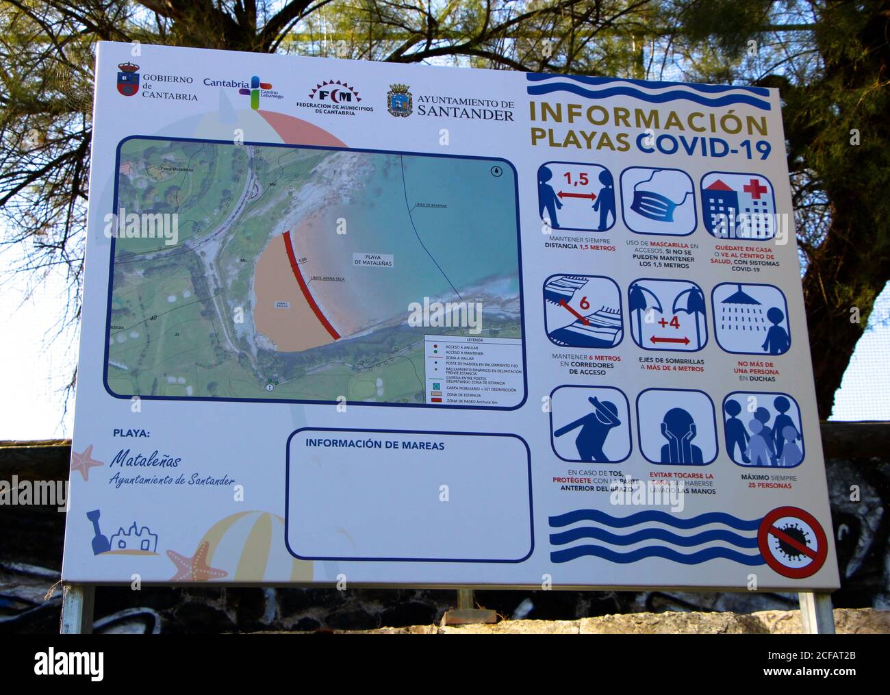 Information sign for the Matalenas beach warning about rules and risks ...