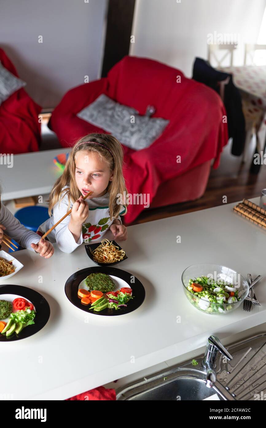 Boy Girl Eating Chopsticks High Resolution Stock Photography and Images ...