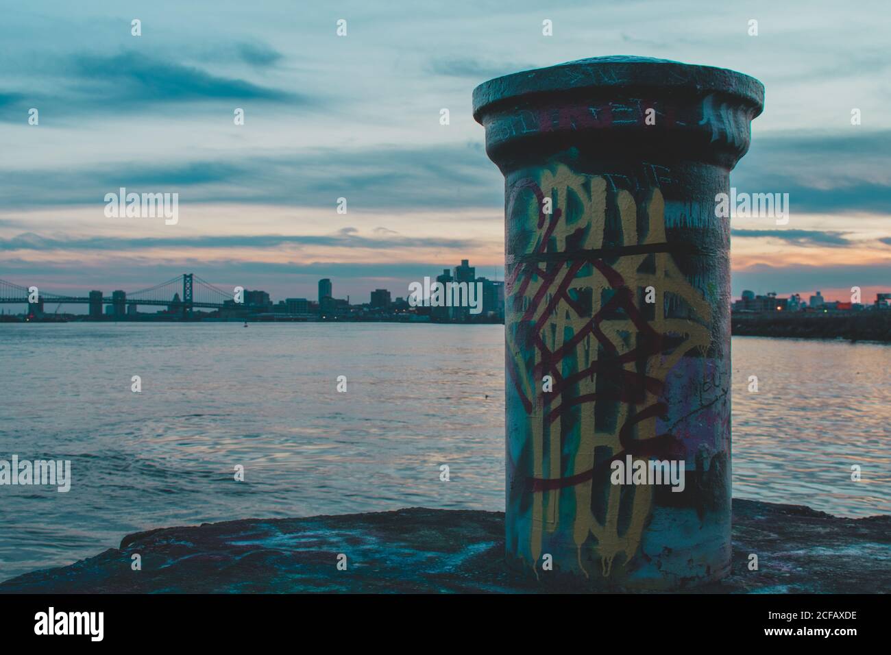 A Graffiti Tagged Pole at Graffiti Pier With the Philadelphia Skyline ...