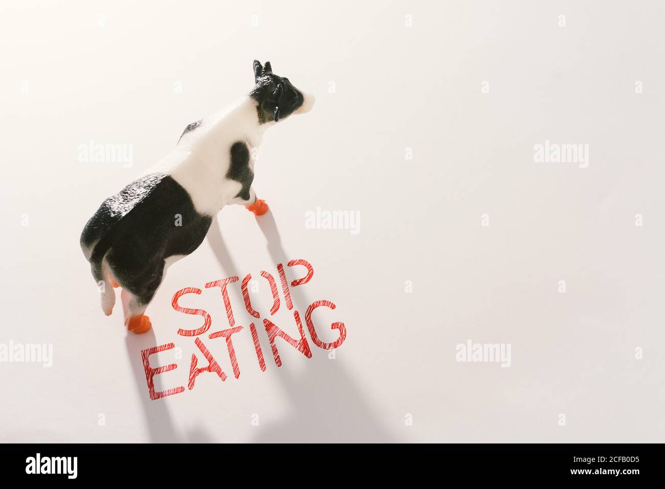 Slogan calling to stop eating animals Stock Photo - Alamy