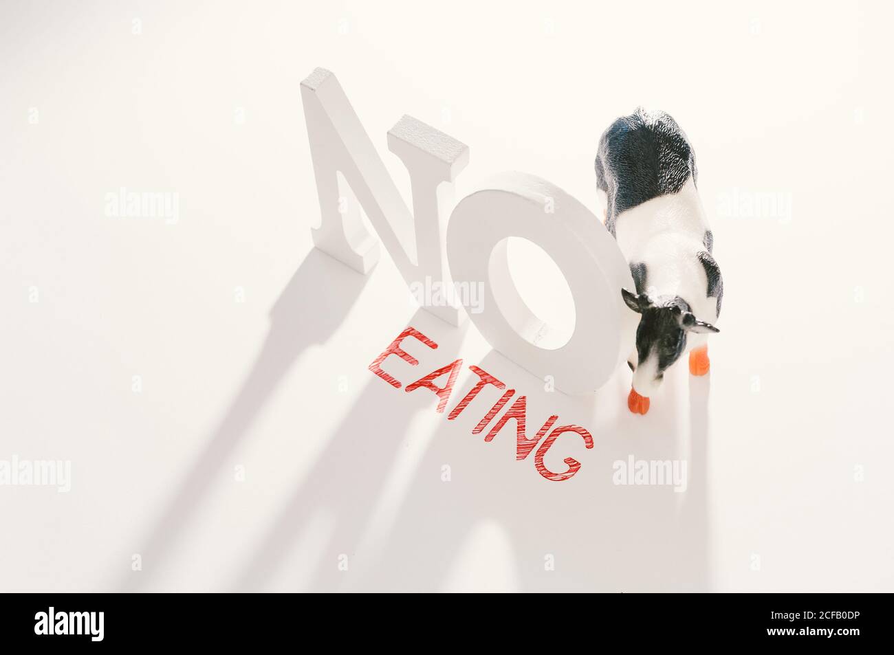Concept of calling to stop eating animals Stock Photo - Alamy