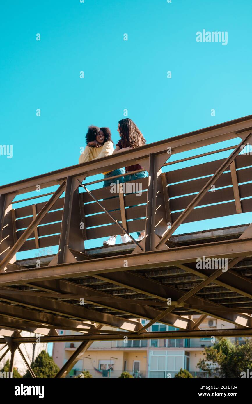 Two girls talking hi-res stock photography and images - Alamy