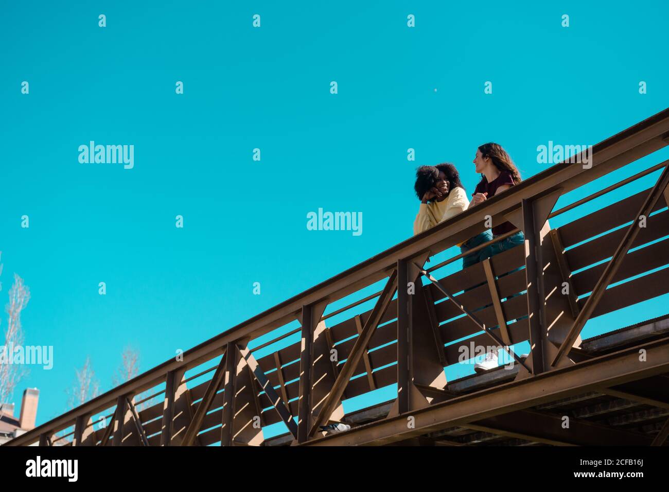 Two girls talking hi-res stock photography and images - Alamy