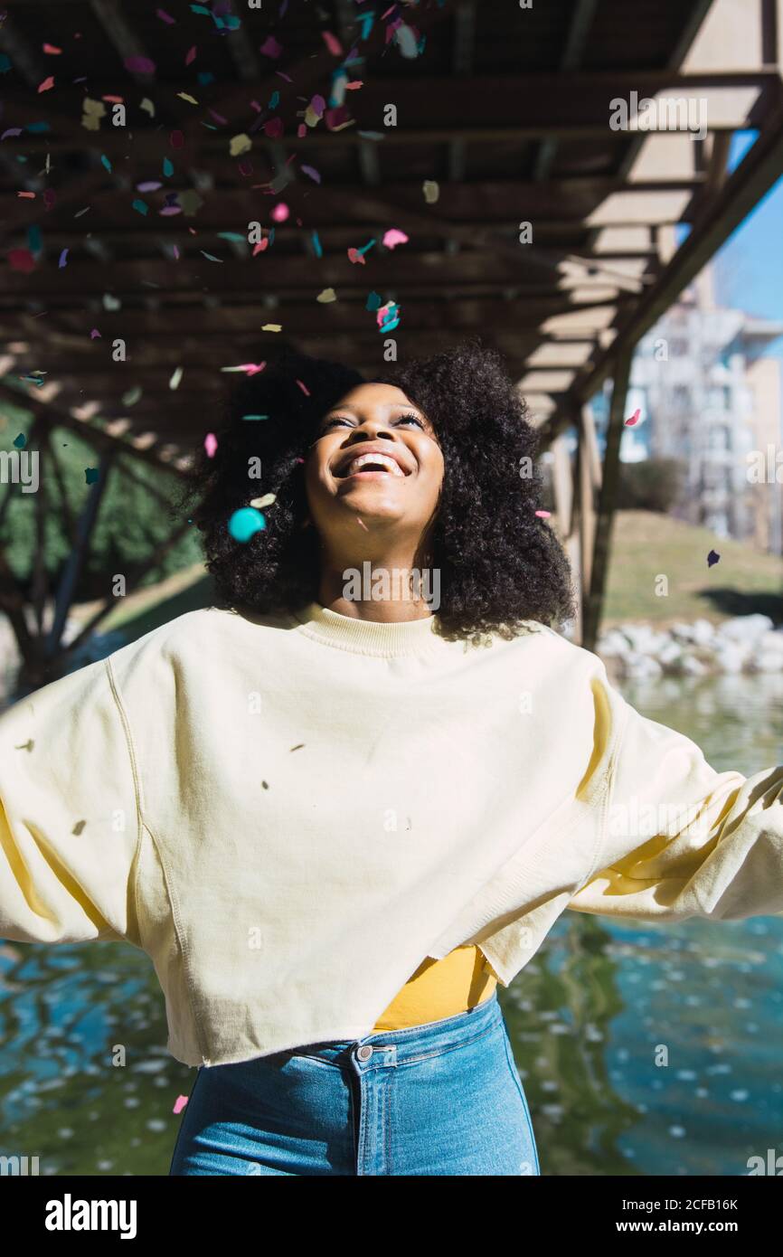 Girl throwing confetti hi-res stock photography and images - Alamy