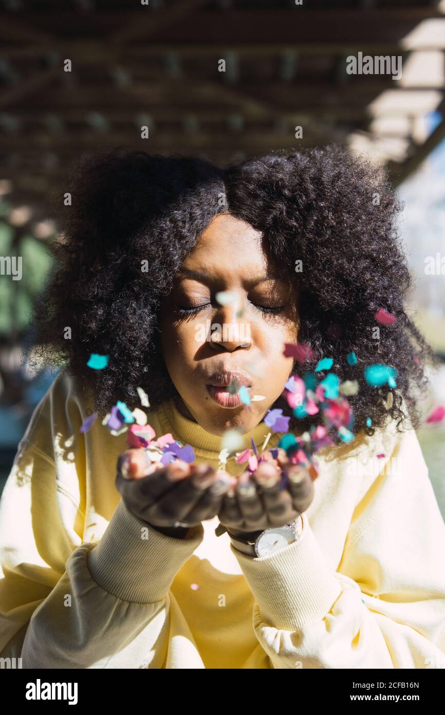 Girl throwing confetti hi-res stock photography and images - Alamy