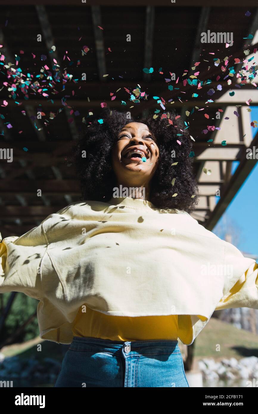 Girl throwing confetti hi-res stock photography and images - Alamy