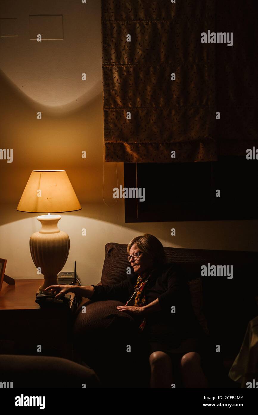 Senior woman phone call night hi-res stock photography and images - Alamy