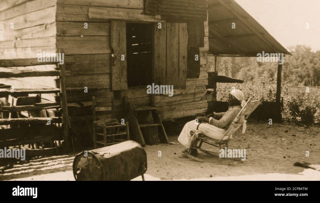 Old Aunt Julia Ann Jackson, age 102 and the corn crib where she lives ...